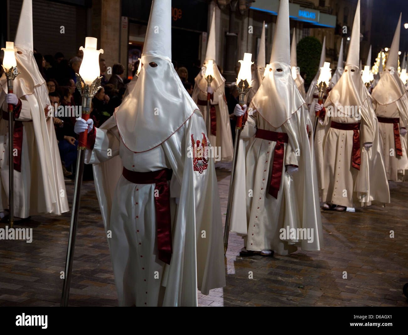 Nazarenos parading during Semana Santa in Cartagena, Spain, March 2013 ...