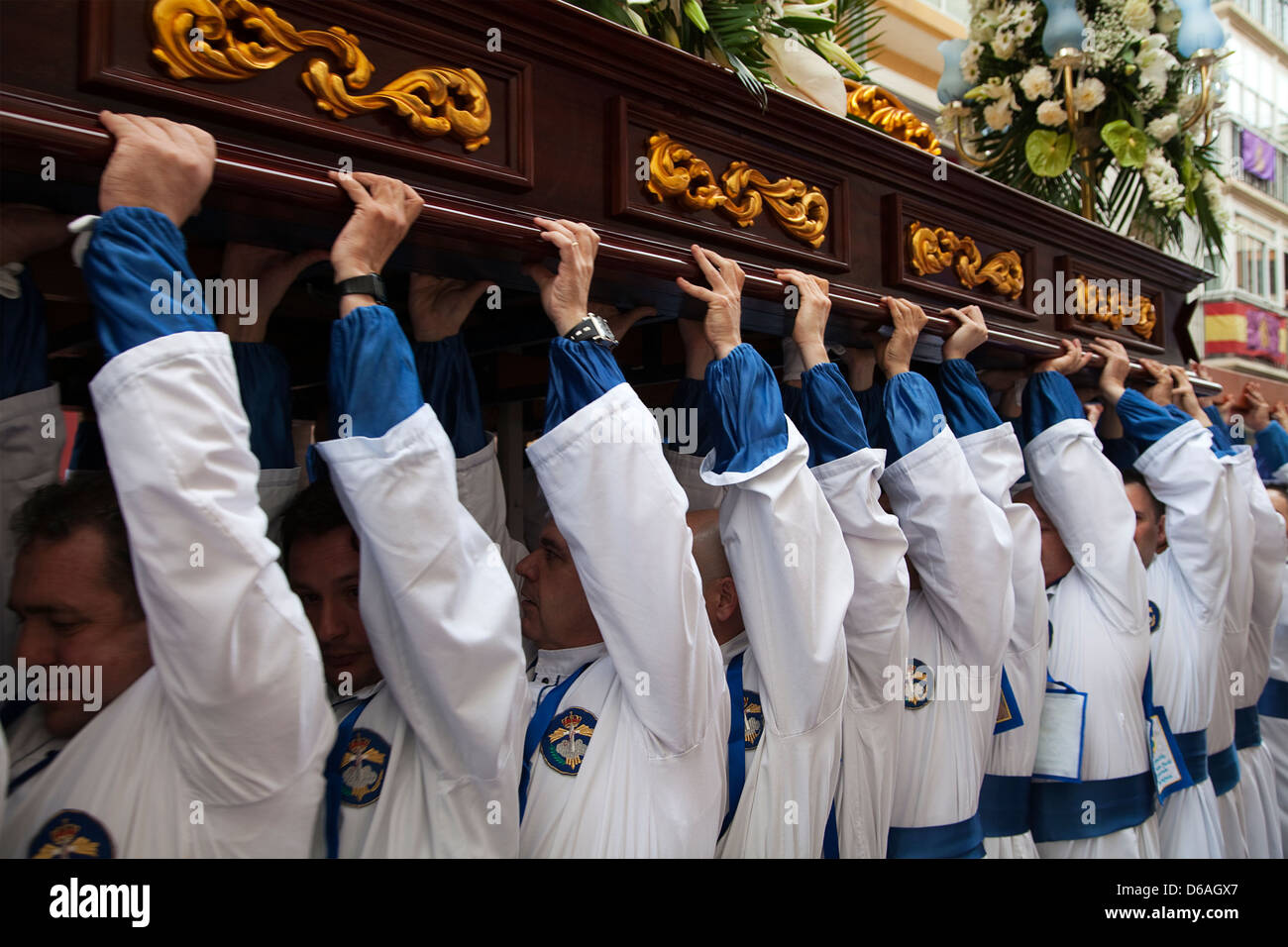 Costaleros carrying a trono during the Semana Santa Processions Stock ...