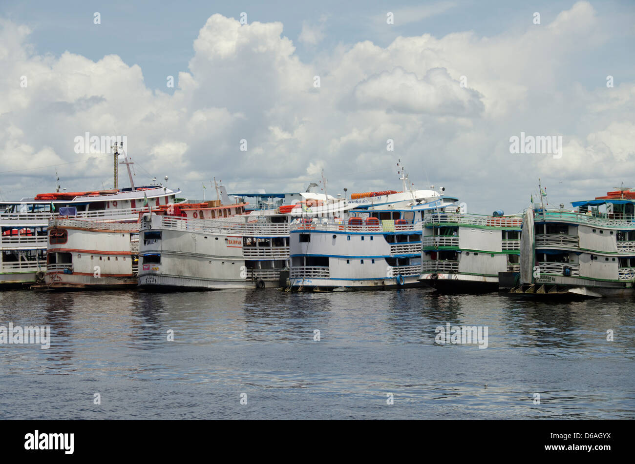 Brazil, Amazon, Manaus. Busy waterfront pier with traditional Amazon ...