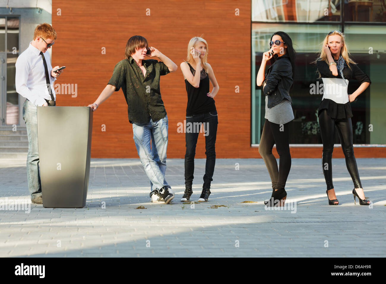 Young people calling on the mobile phones Stock Photo - Alamy