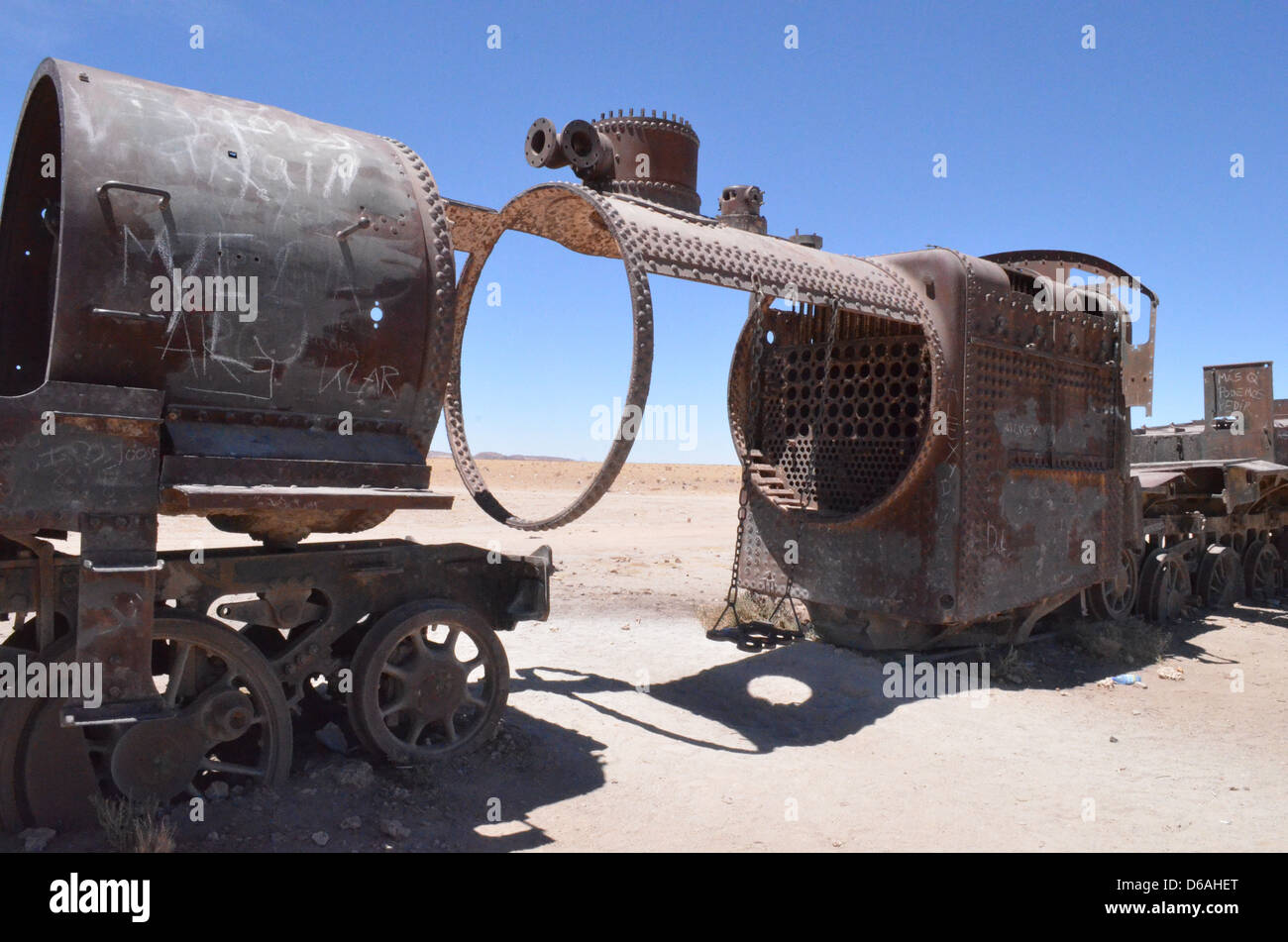 An old steam locomotive rusting away in the train graveyard near Uyuni ...