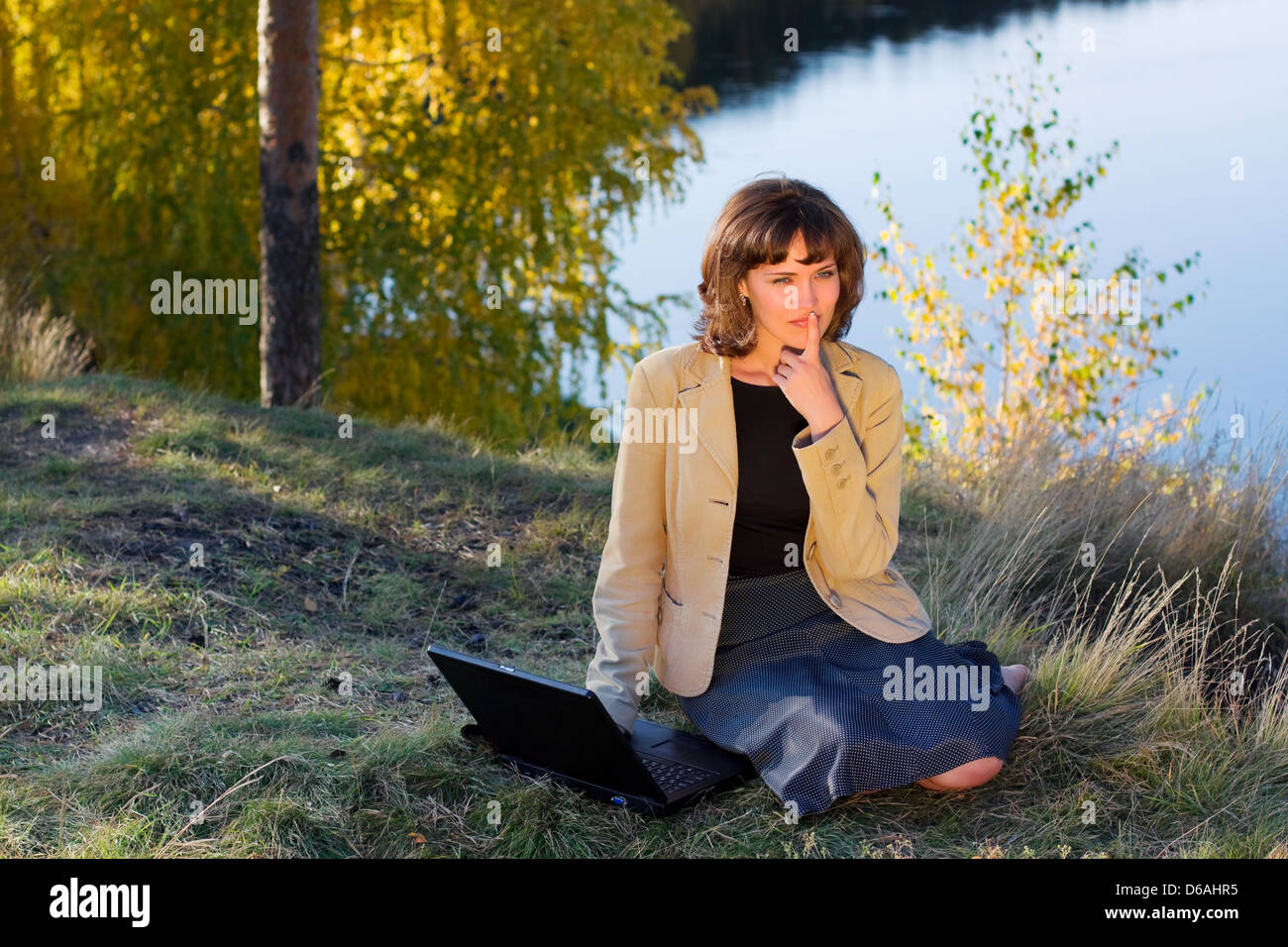 Businesswoman working on nature Stock Photo - Alamy
