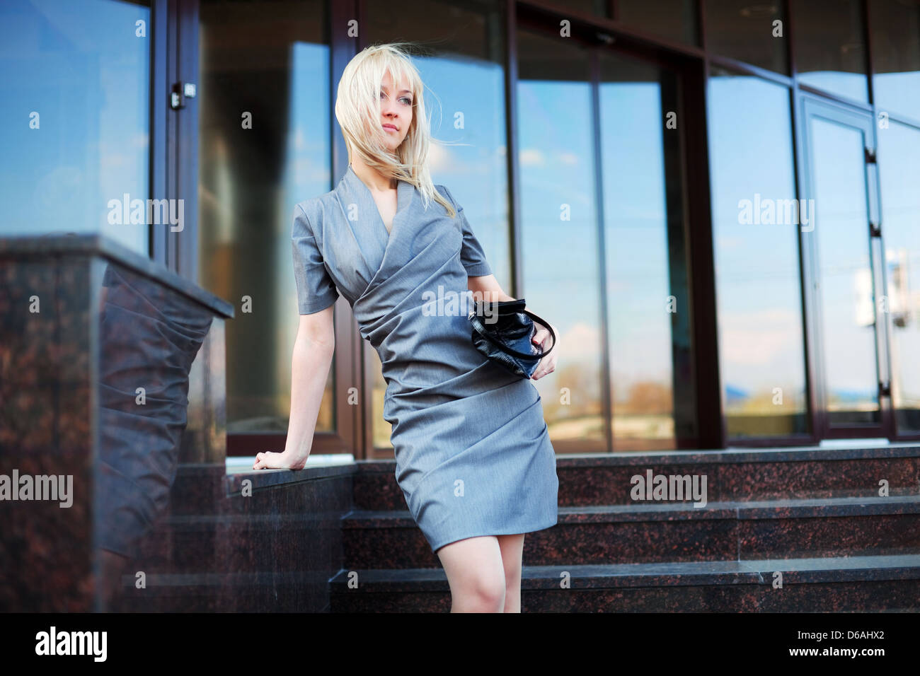 Young businesswoman on the steps Stock Photo - Alamy