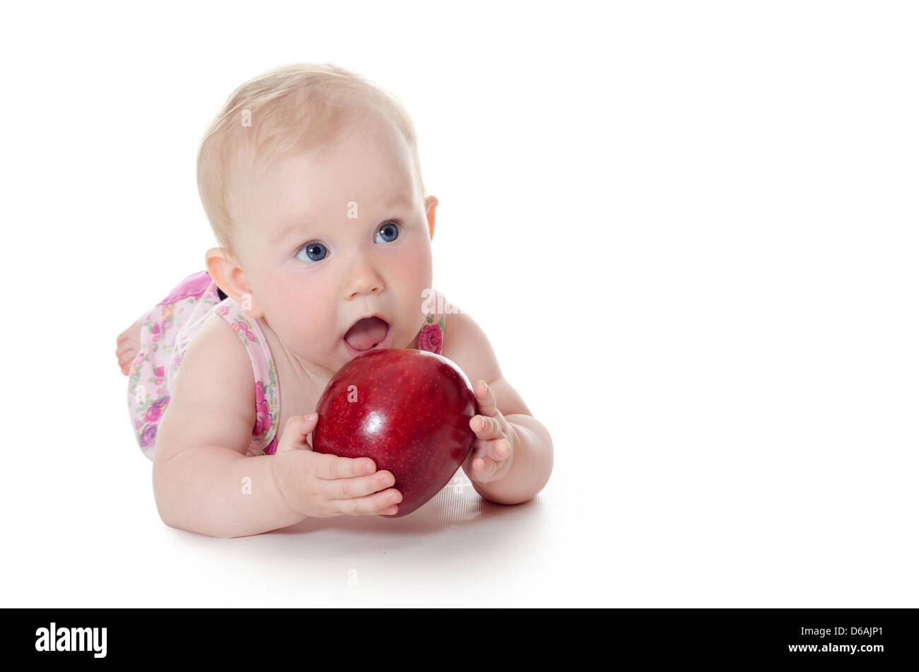 The little baby with red apples Stock Photo - Alamy