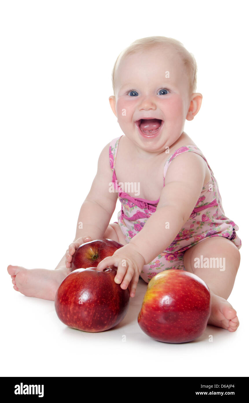 The little baby with red apples Stock Photo - Alamy