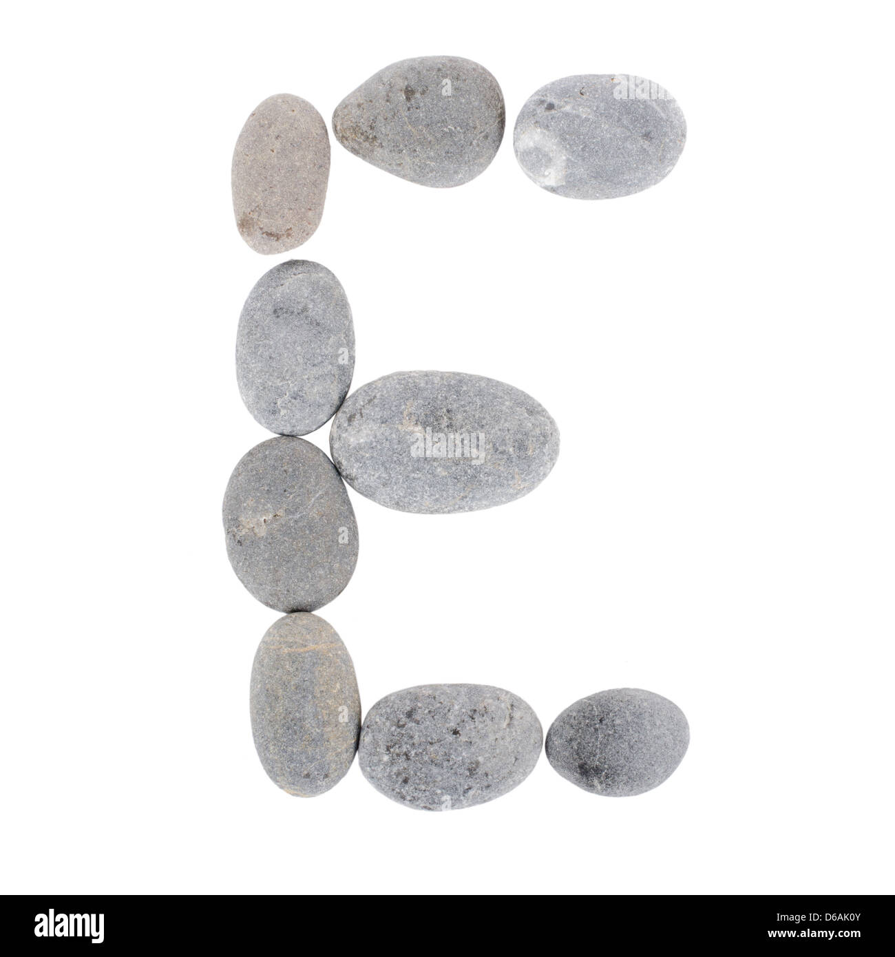 The letter of the alphabet from stones Stock Photo - Alamy