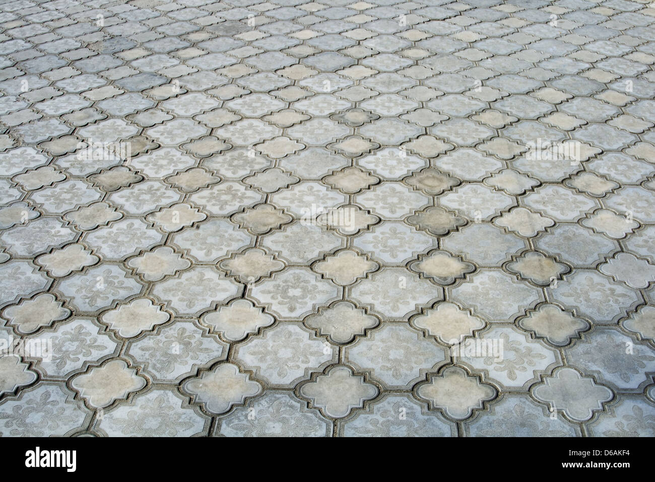 Grey stone block paving background Stock Photo - Alamy