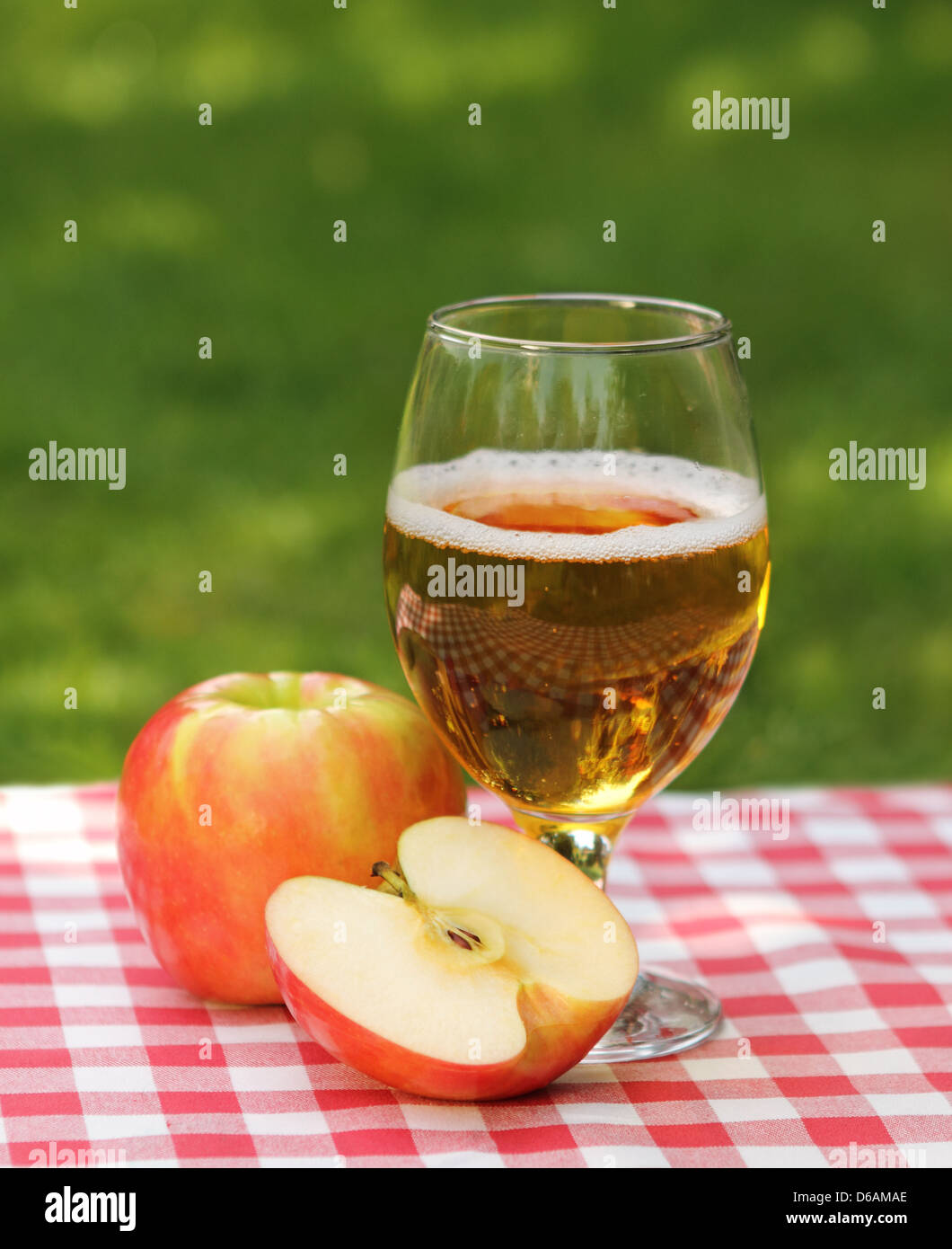 Apple cider and apples Stock Photo - Alamy