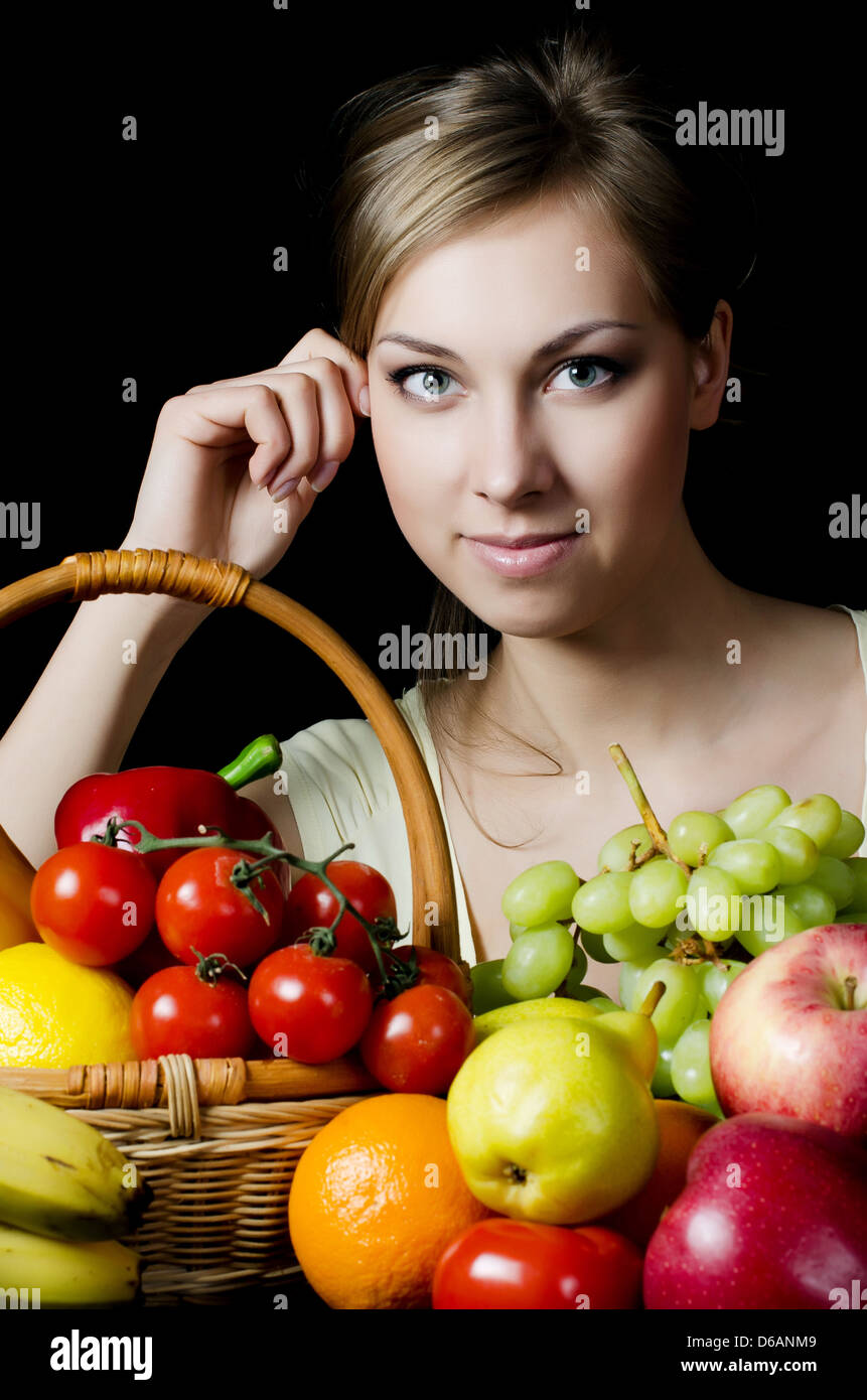 Beautiful girl with fruit and vegetables Stock Photo - Alamy