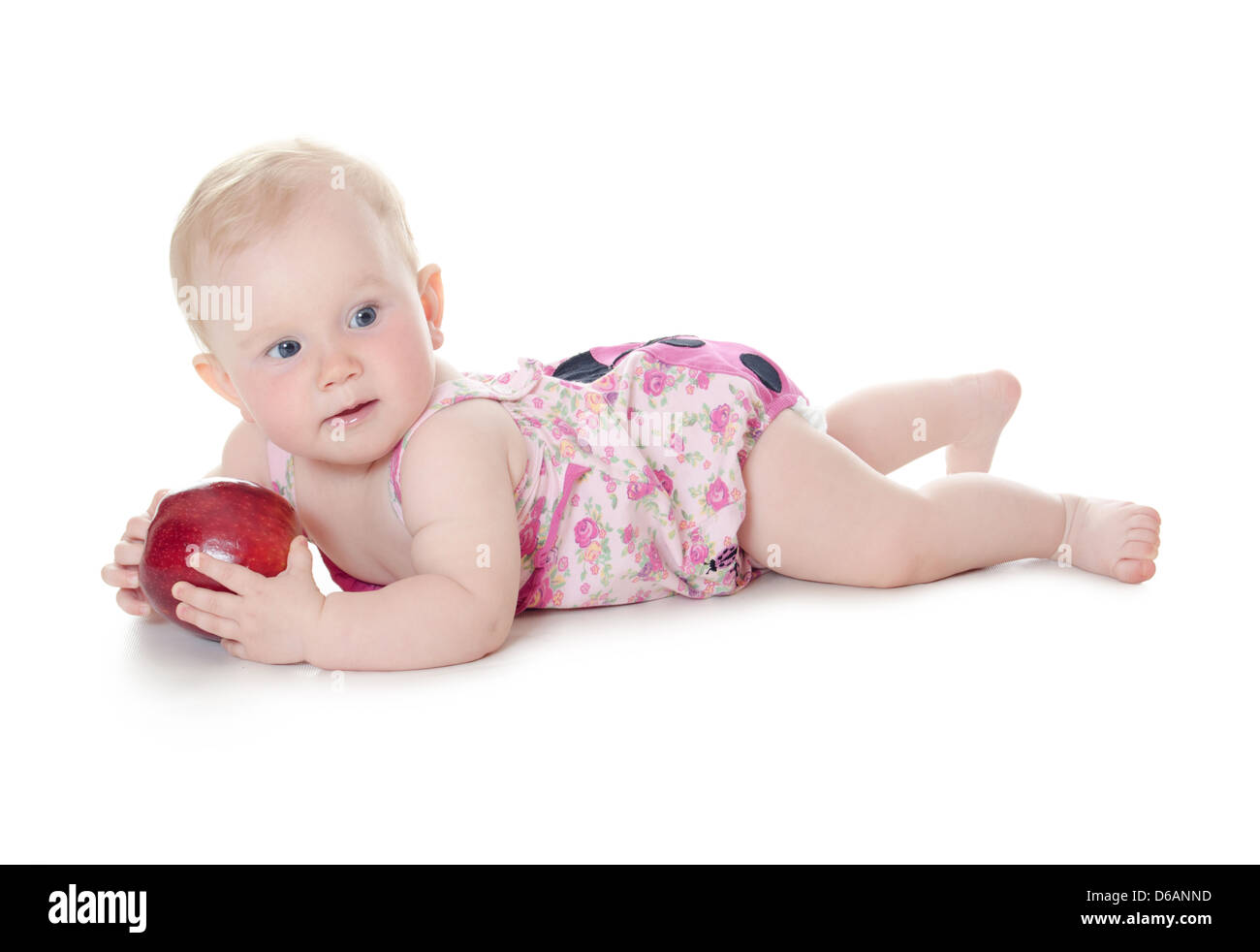 The little baby with red apples Stock Photo - Alamy
