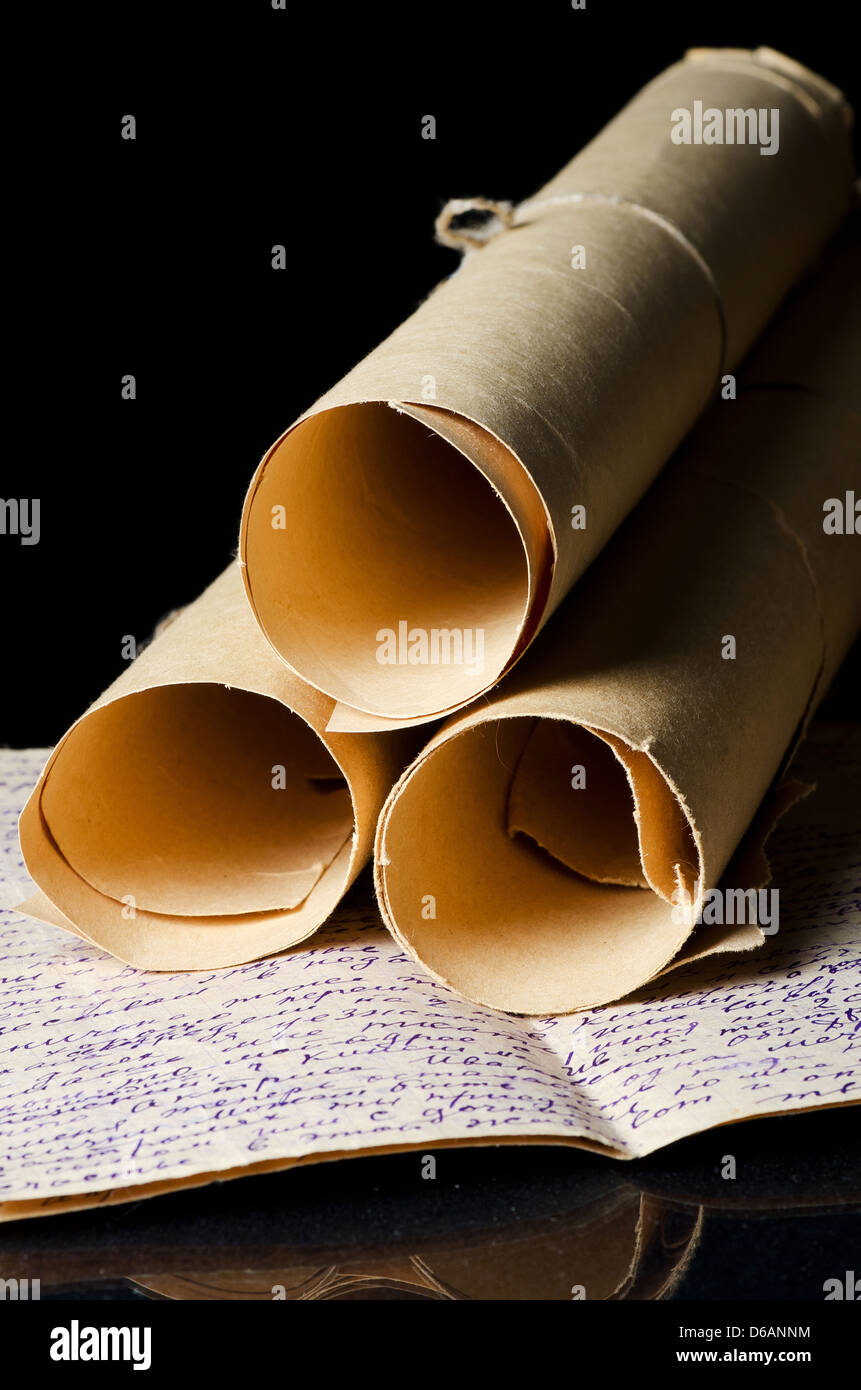 Many scrolls isolated on a black Stock Photo - Alamy