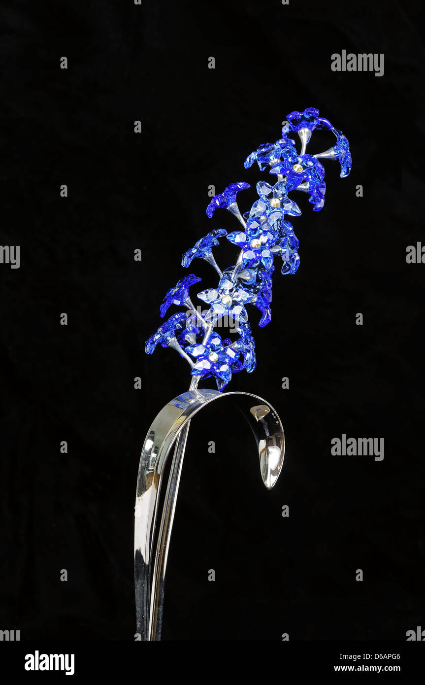 Crystal iris flower against a black background Stock Photo - Alamy