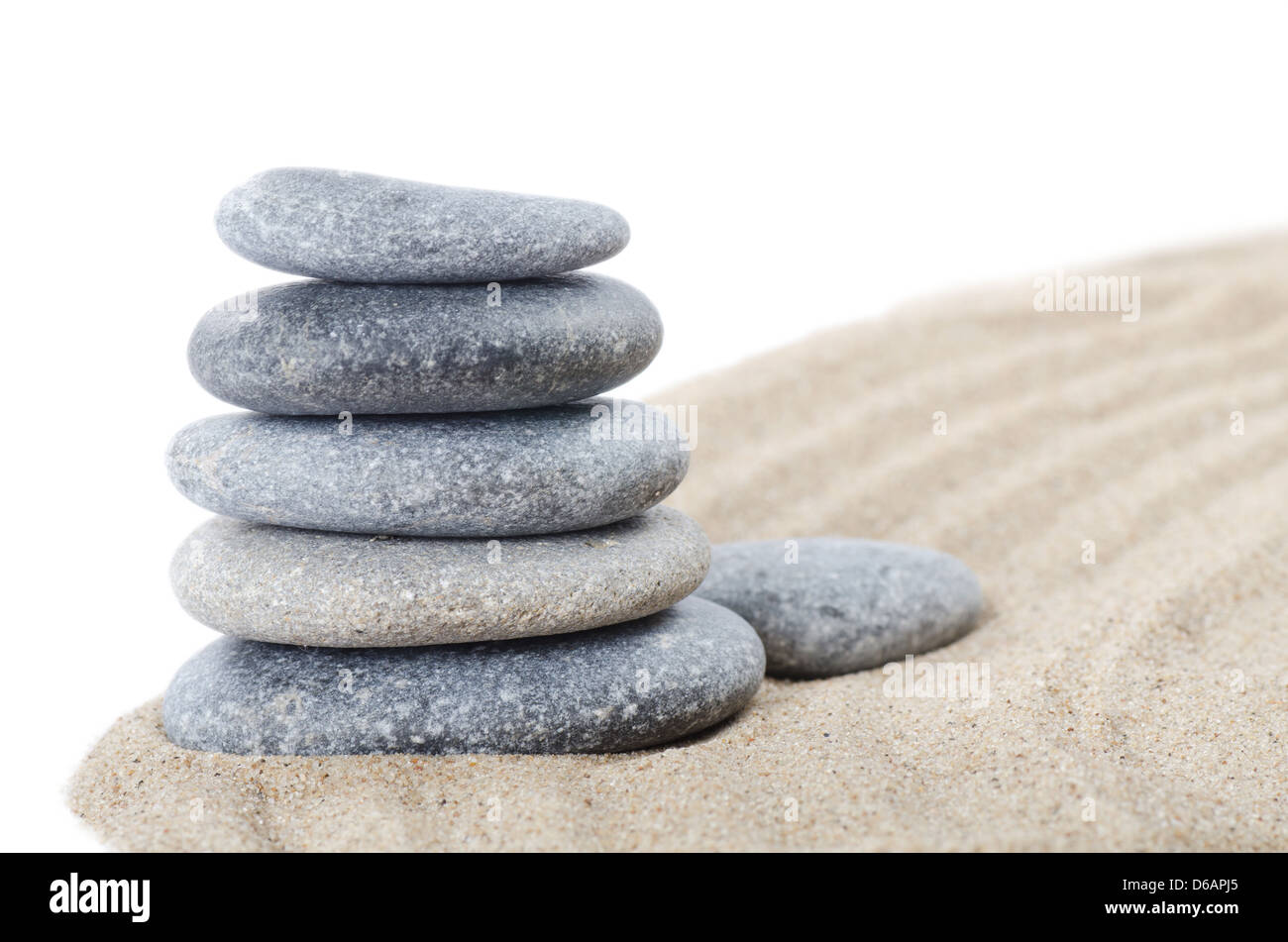 Stones on sand Stock Photo - Alamy