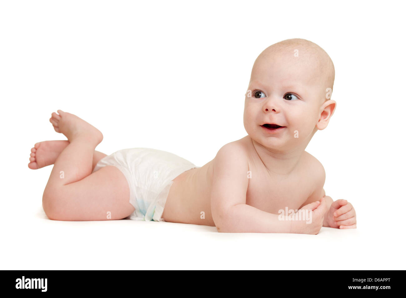 smiling baby boy lying on tummy isolated on white background Stock ...