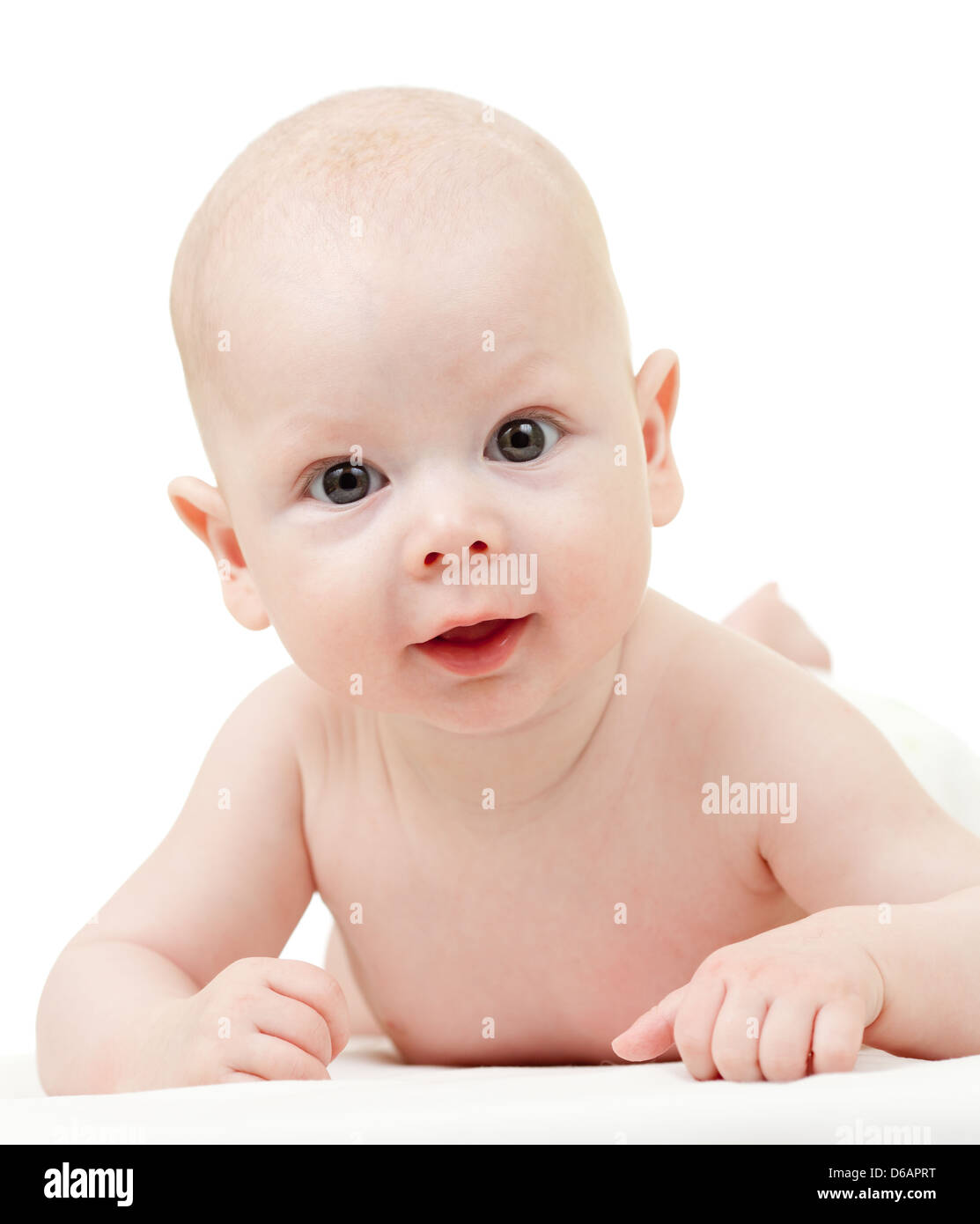 smiling baby boy lying on tummy isolated on white background Stock ...