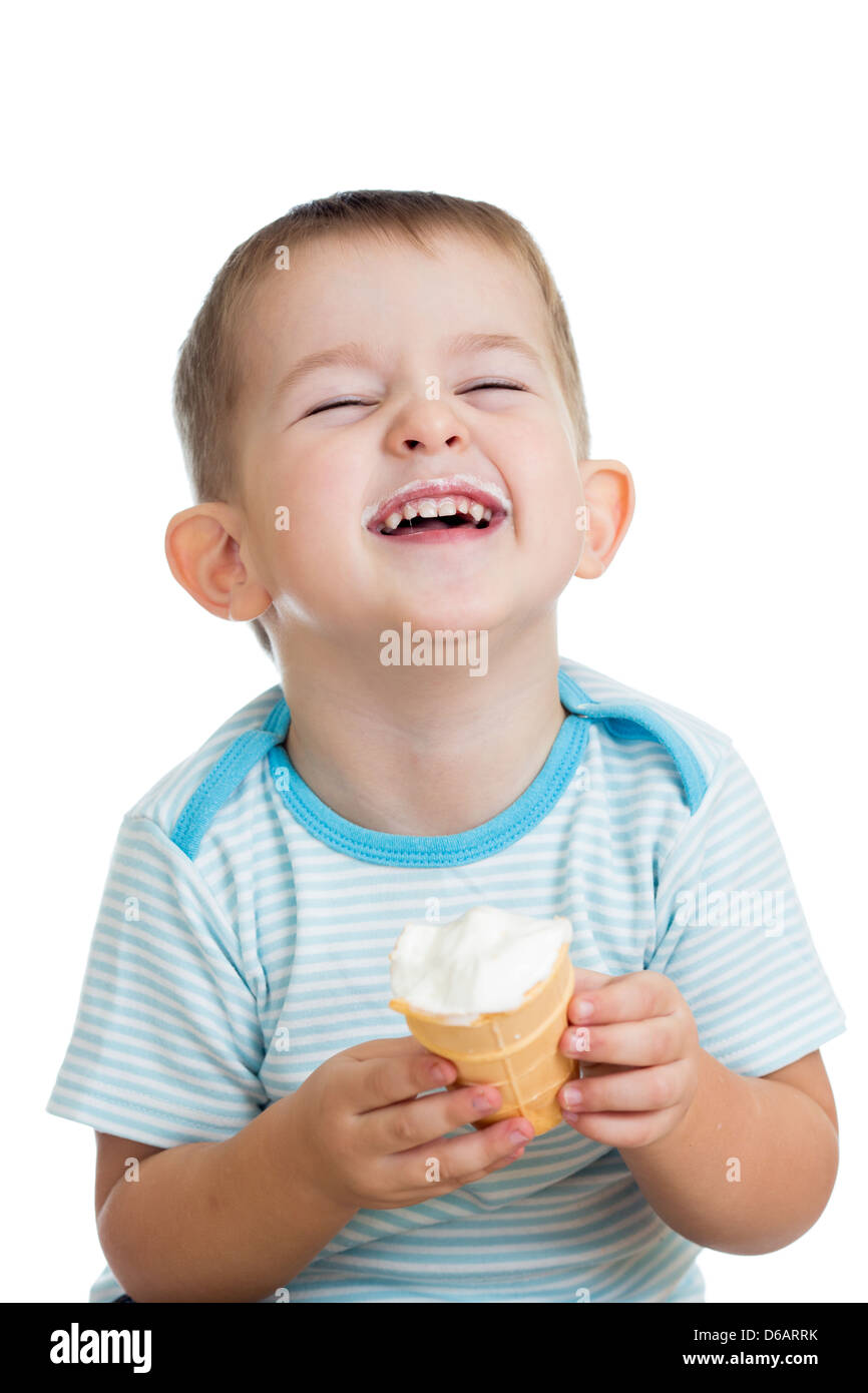 happy kid boy eating ice cream in studio isolated Stock Photo - Alamy