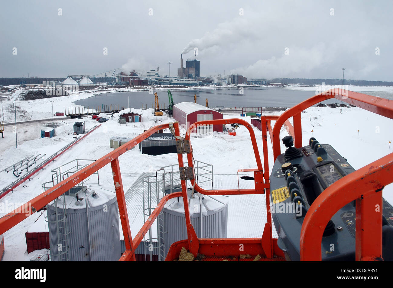 Factory with smoke on sky at winter. Sweden - Skutskar, paper mill ...