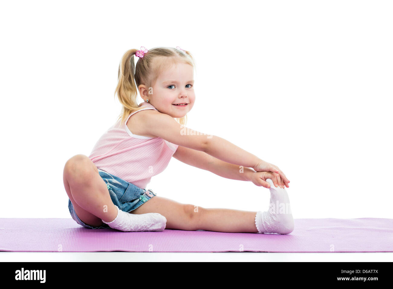 Little girl doing fitness exercises Stock Photo - Alamy