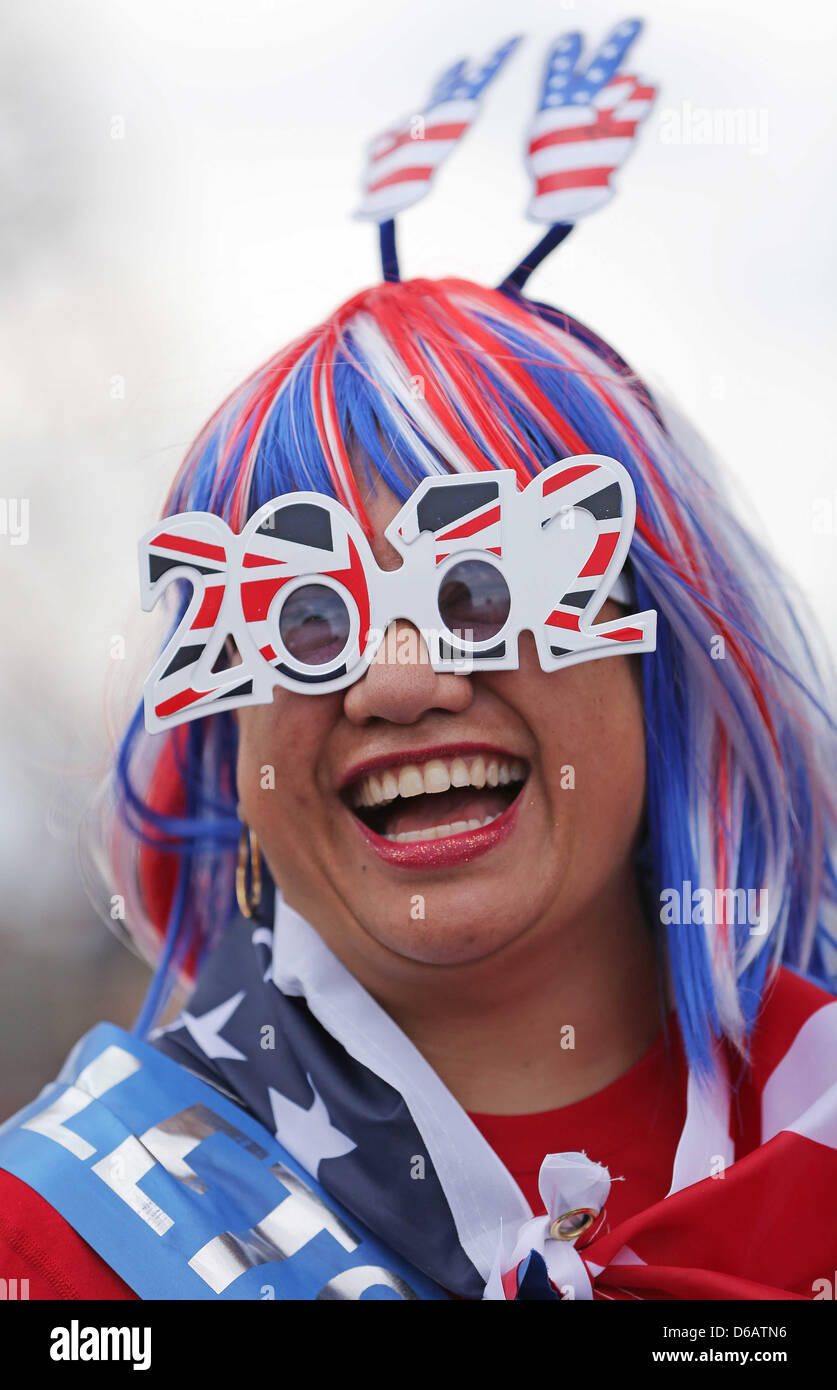 An American spectator flashes a smile during a visit at the Olympic ...