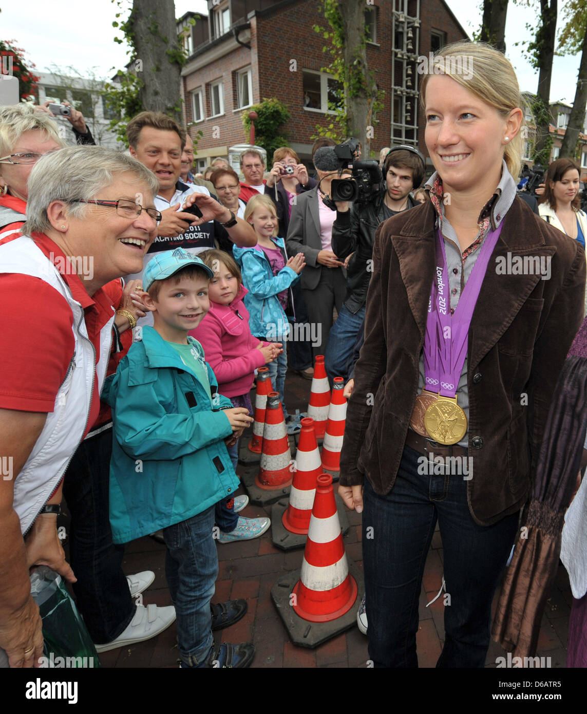 2012 Olympic team gold medal winner in eventing Sandra Auffarth walks ...
