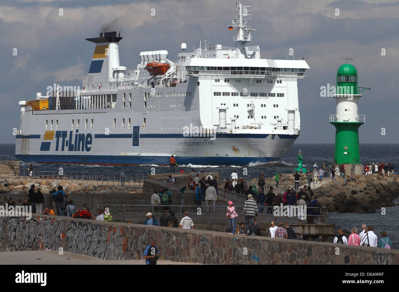 The TT-Line ferry Huckleberry Finn passes Warnemuende coming from ...