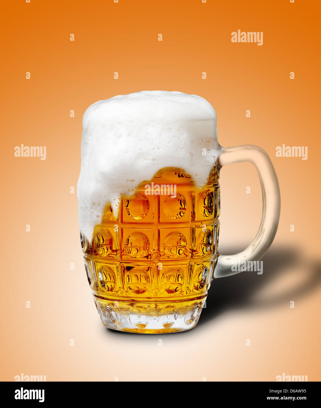 goblet of light beer foam. lager beer in a glass beaker with fresh ...