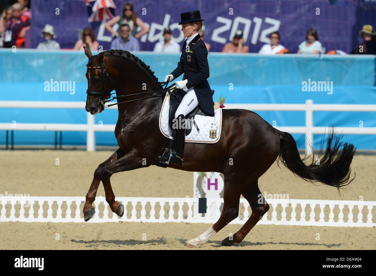 Helen Langehanenberg of Germany rides her horse Damon Hill in the ...