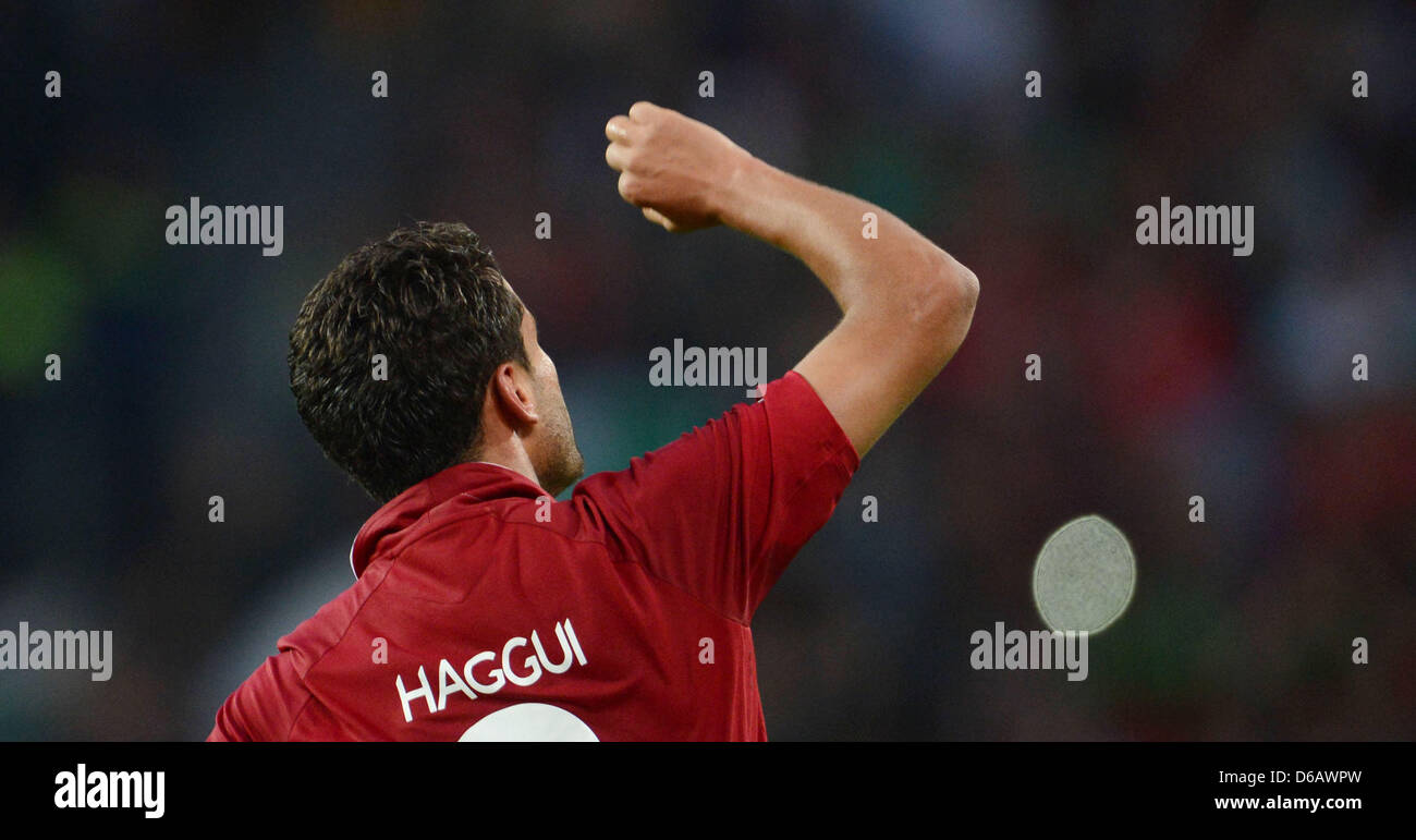 Hanover's Karim Haggui cheers after scoring the 1-0 during the Europa ...
