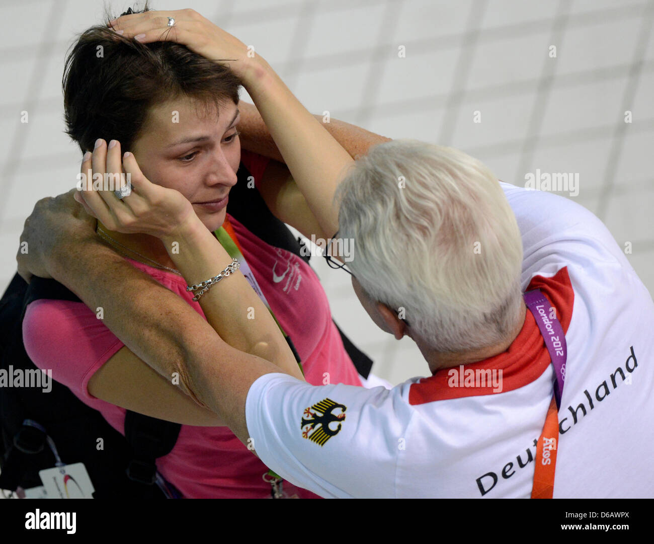 Christin Steuer of Germany talks to her coach Uwe Fischer (r) during ...