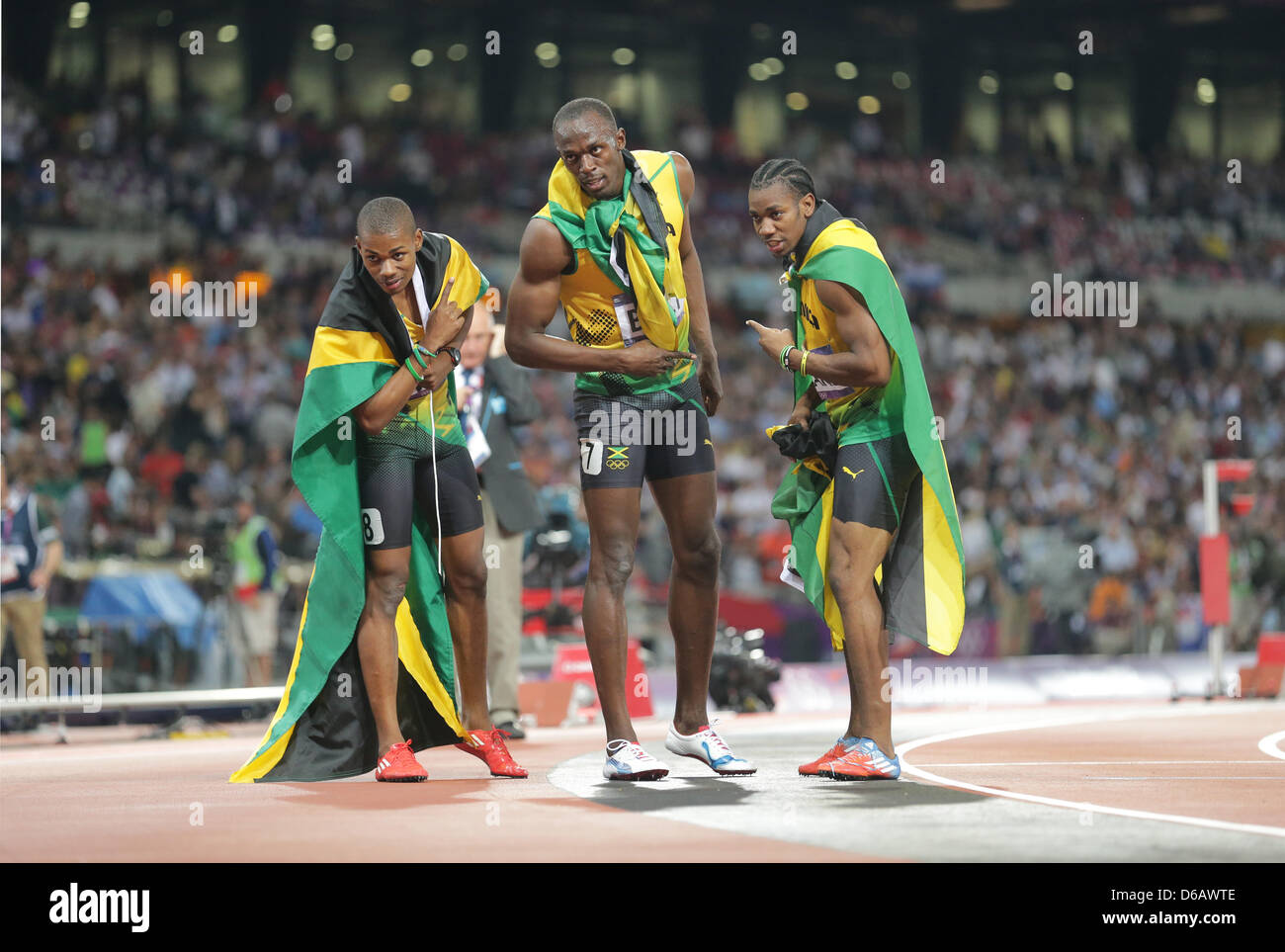 Bronze medal winner Warren Weir (L-R), gold medal winner Usain Bolt and ...
