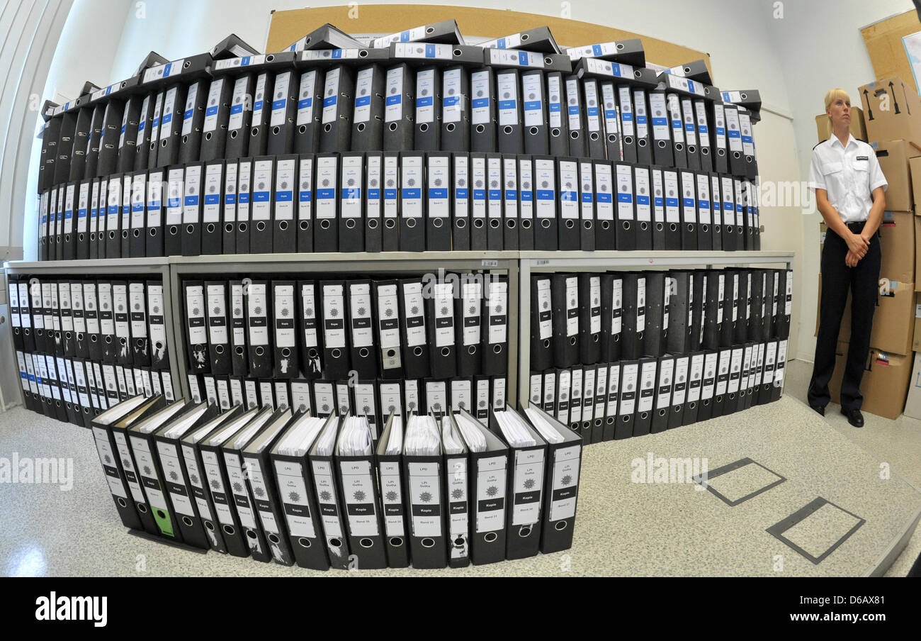 File folders sit on shelves at the state police headquarters in Erfurt ...