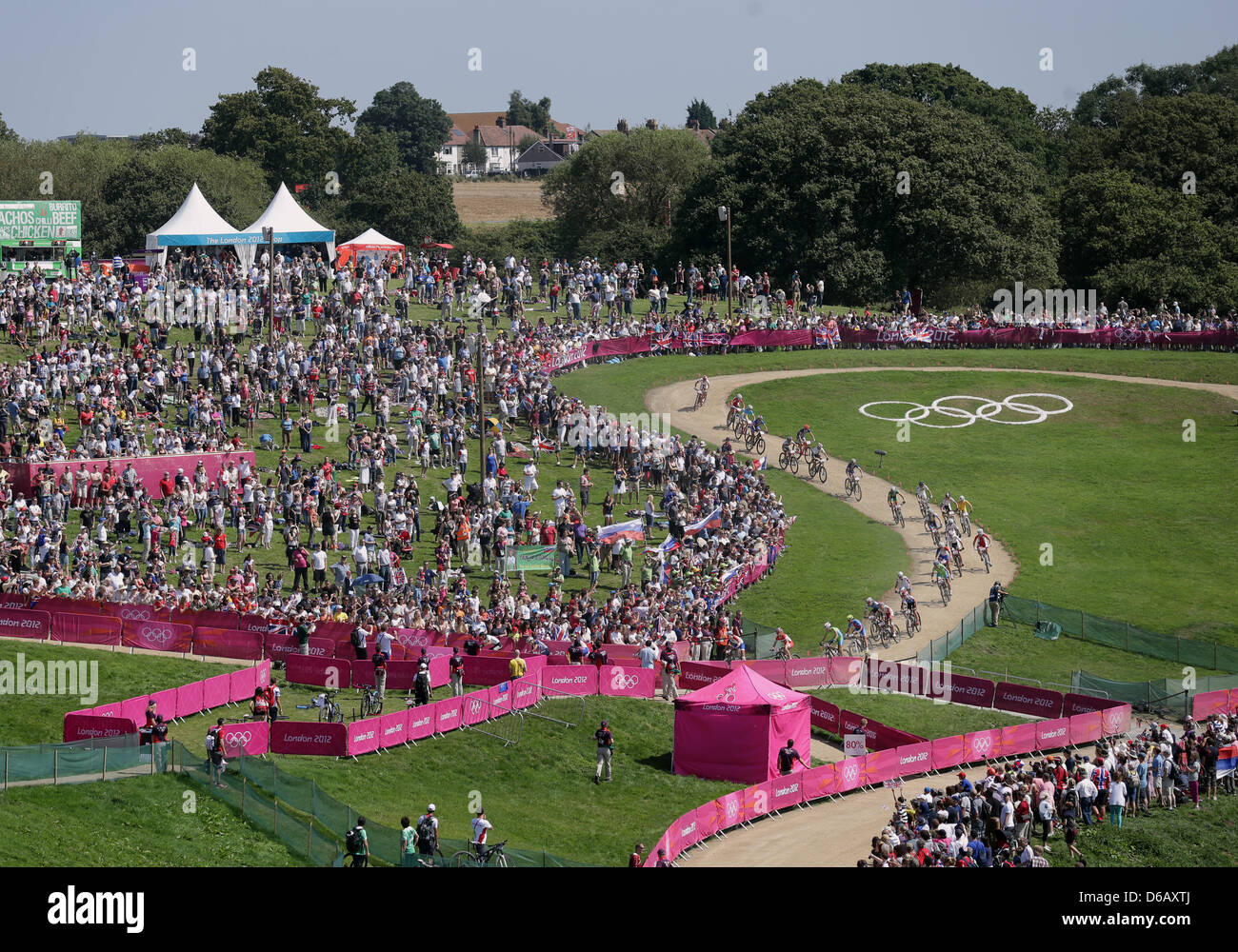 Participants compete during the Women's Cross-country Final of the ...