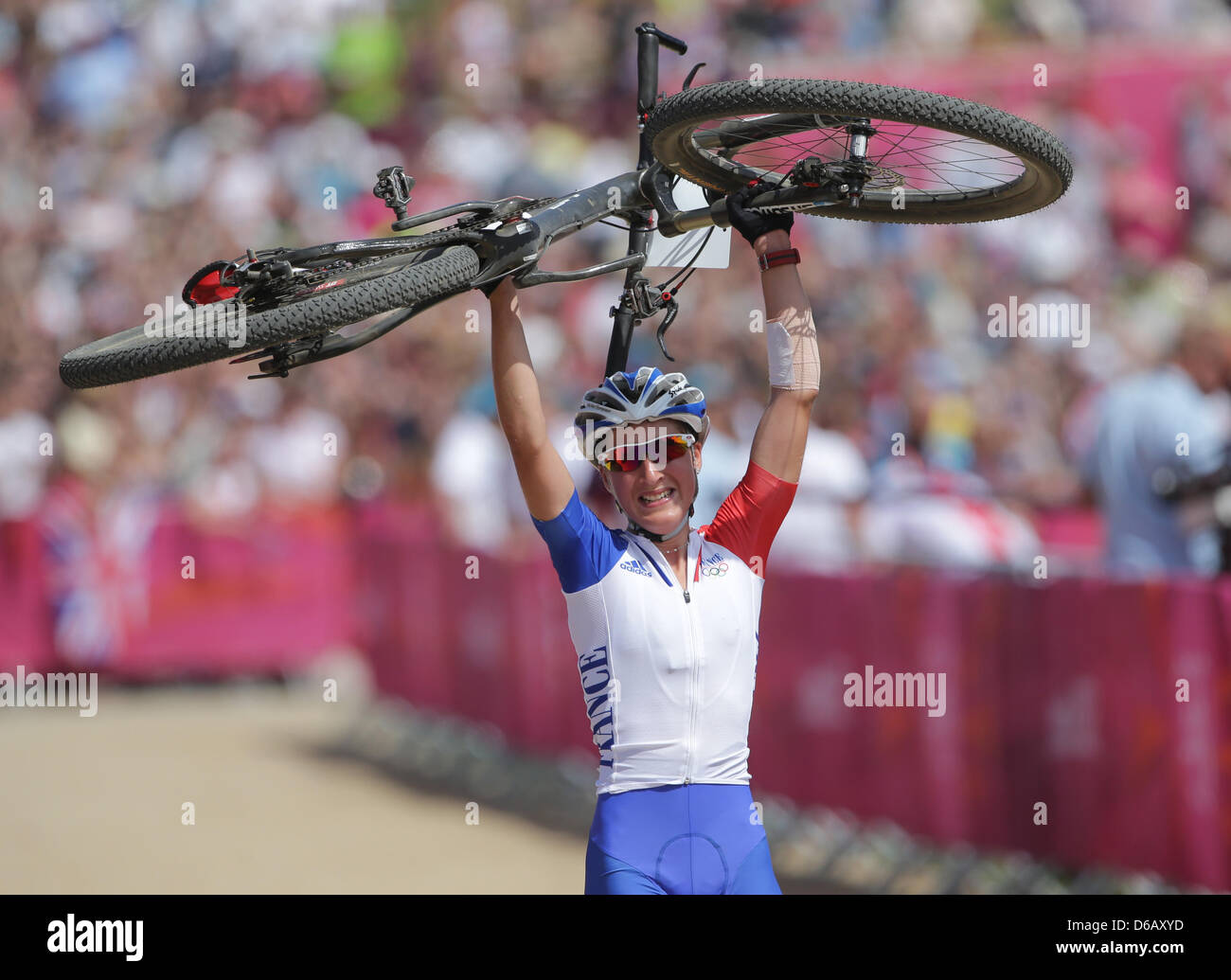 Julie Bresset of France celebrates after winning the gold medal after ...