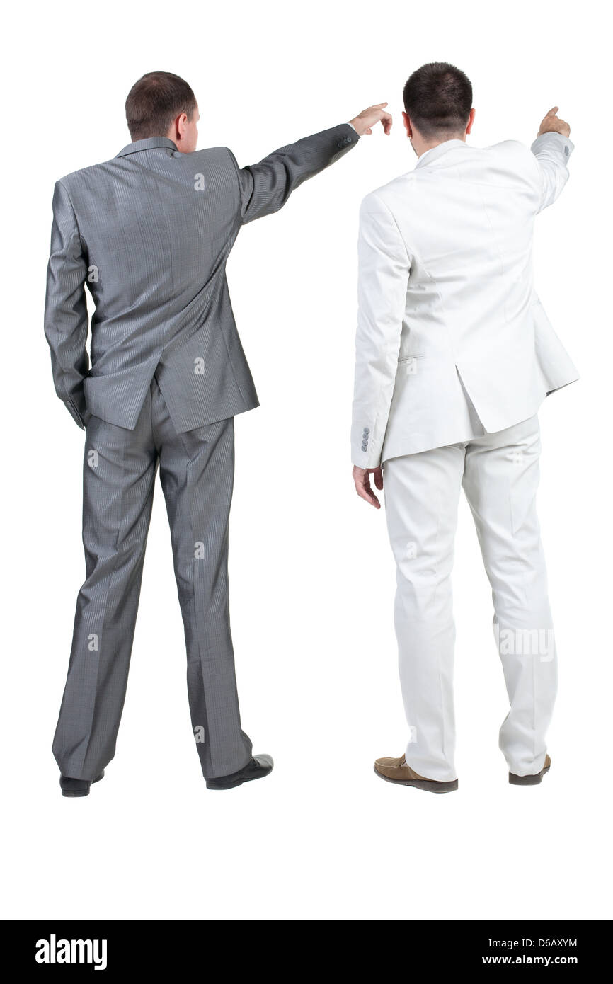 Back view of two businessman pointing at wall. Rear view. Isolated over ...