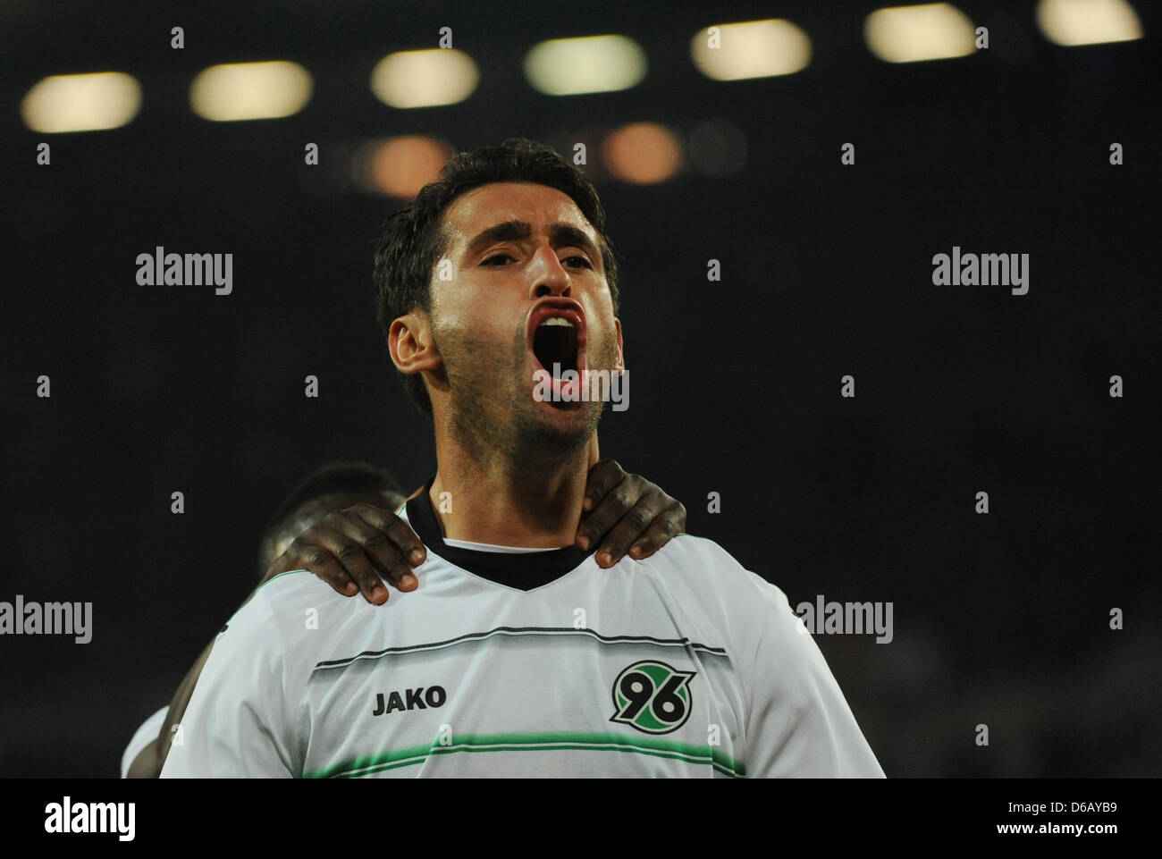 Hanover's Karim Haggui celebrates after scoring during a friendly ...