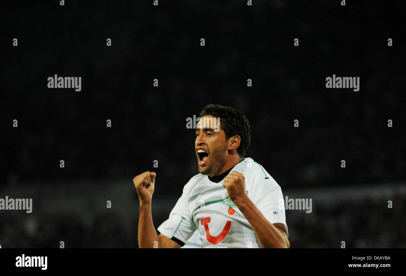Hanover's Karim Haggui celebrates after scoring during a friendly ...