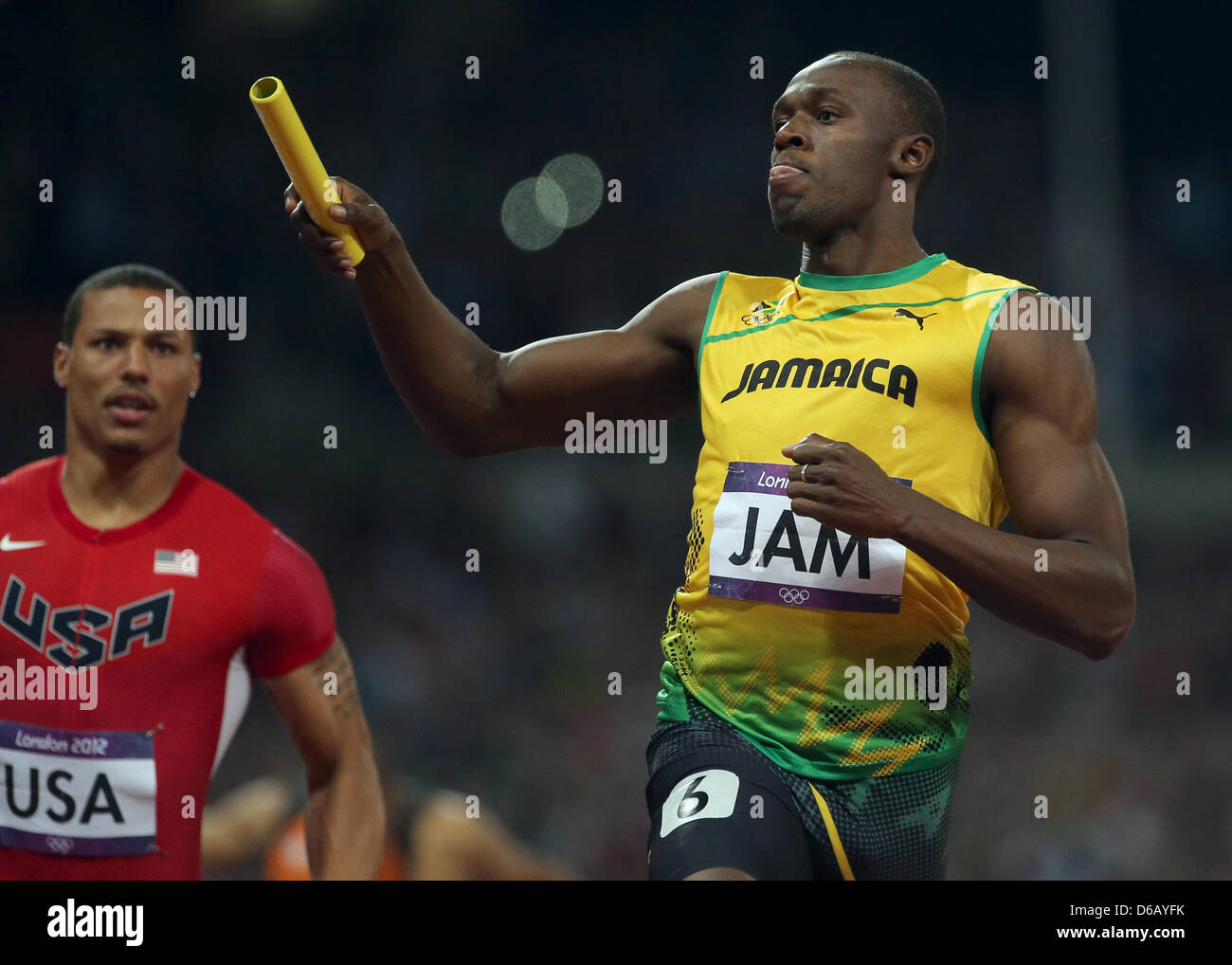 Usain Bolt (R) of Jamaica and Ryan Bailey (L) of USA in action during ...