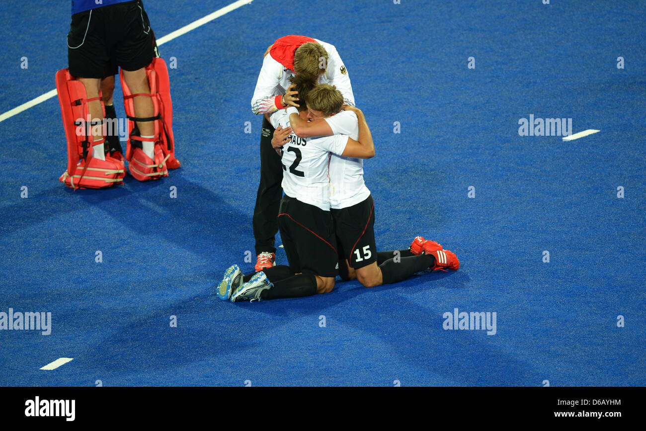 Germany's Matthias Witthaus (L) and Benjamin Wess (R) celebrate after ...
