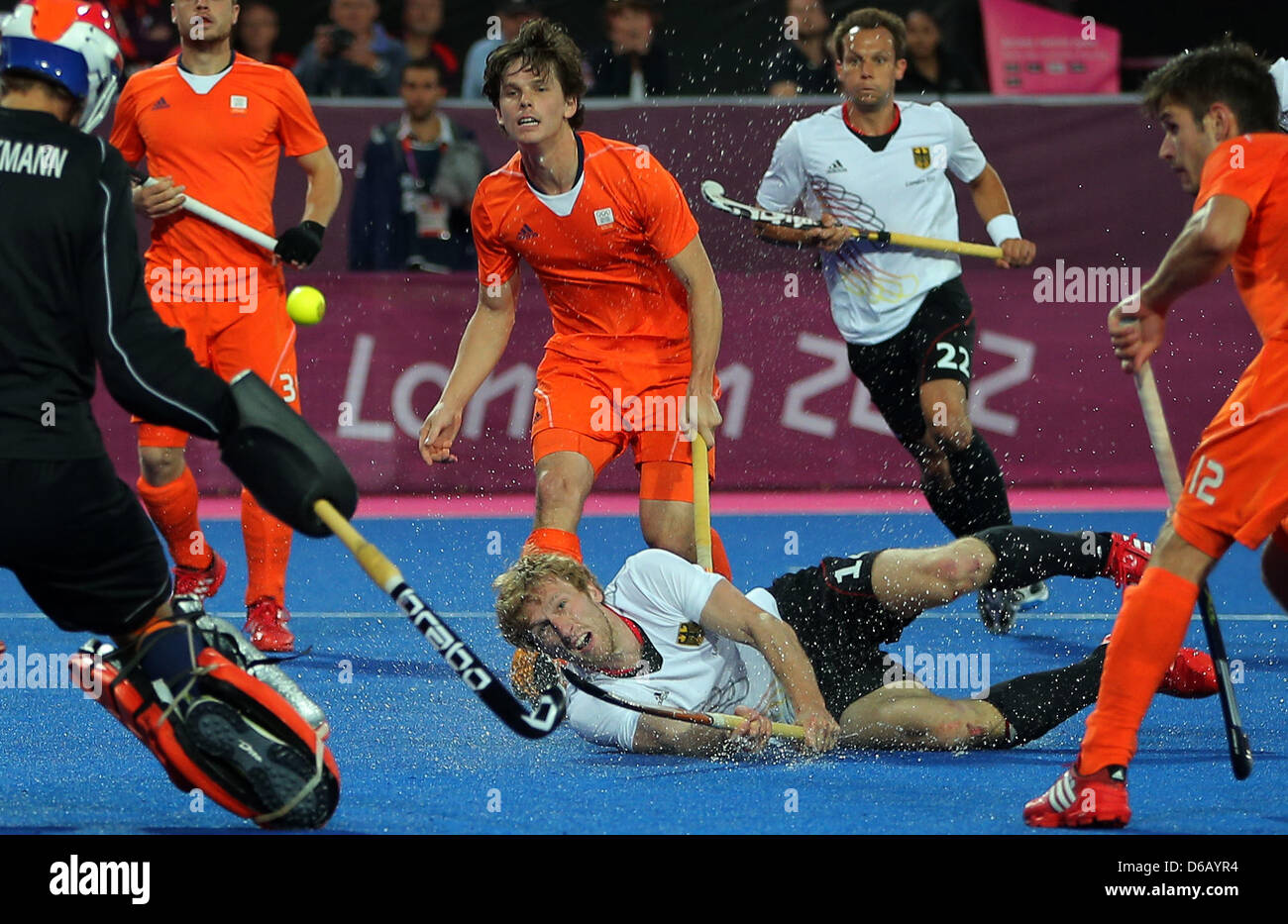 Germany's Jan Philipp Rabente (C bottom) scores the 1-0 against ...