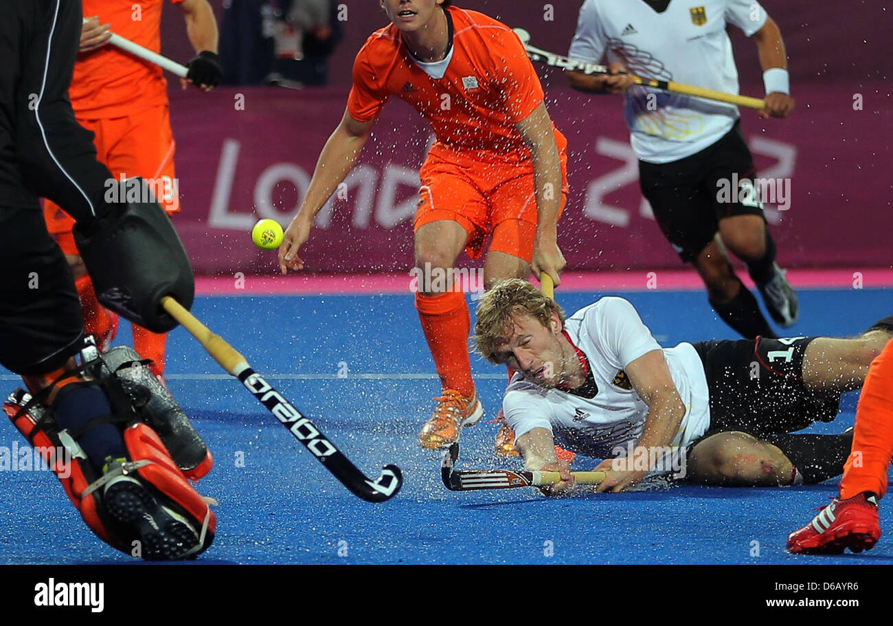 Germany's Jan Philipp Rabente (C bottom) scores the 1-0 against ...