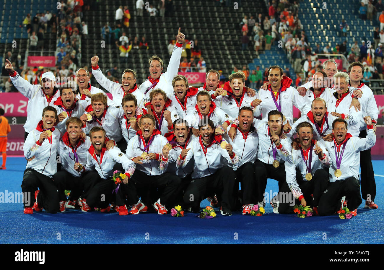 Germany's field hockey player celebrate with their gold medals after ...