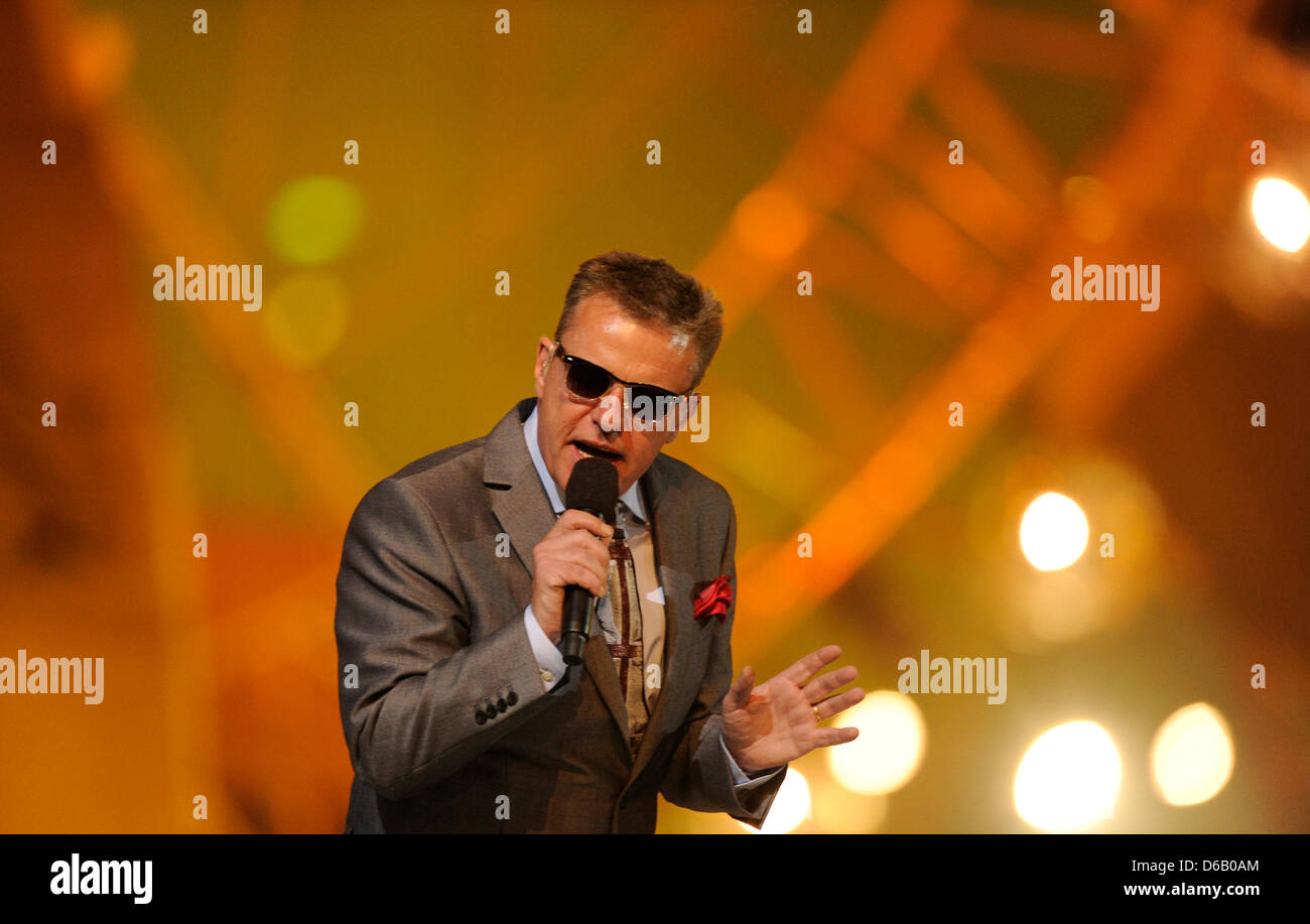 Lead singer Suggs McPherson of Madness performs at the Olympic stadium ...