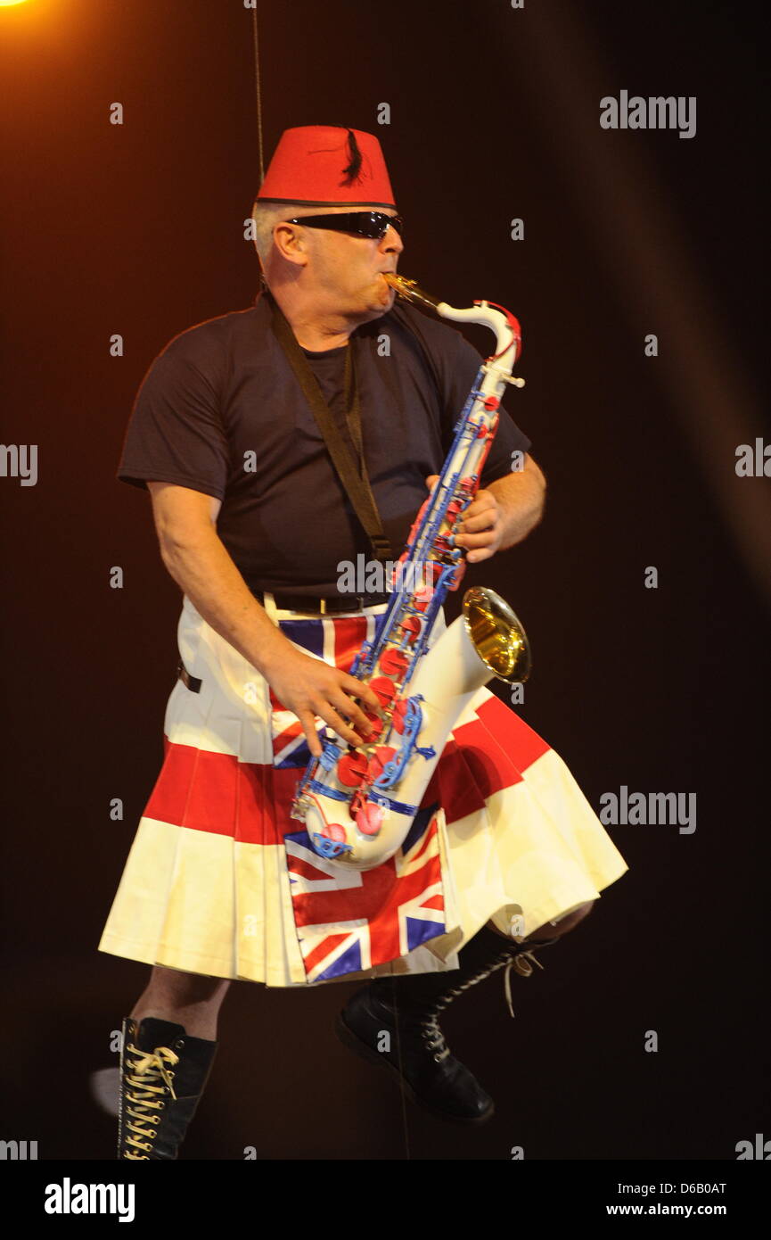 Lee Thompson plays the saxophone with Madness during the Closing ...
