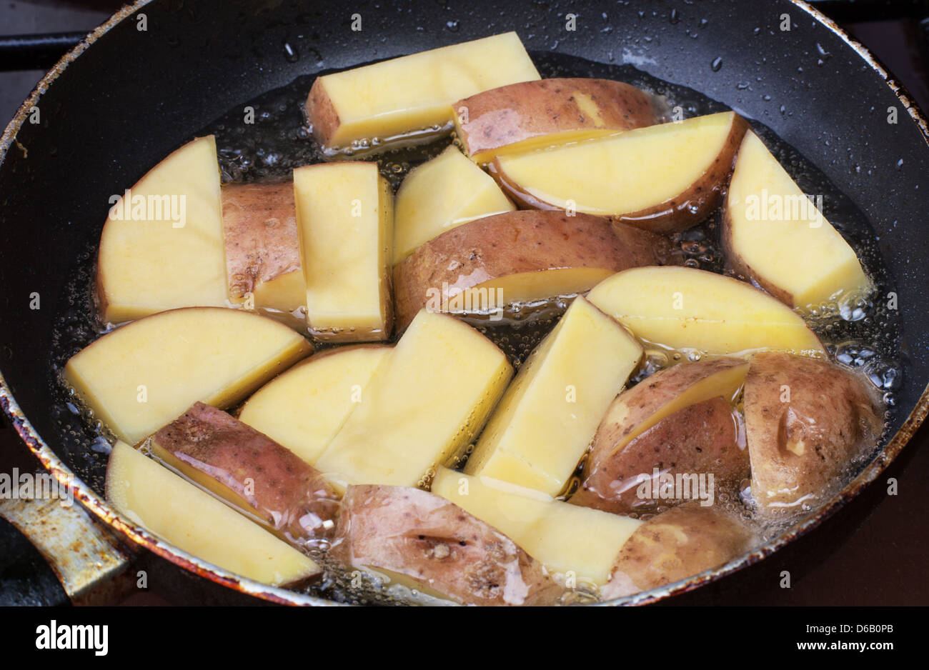 Fried potatoes in pan frying hi-res stock photography and images - Alamy