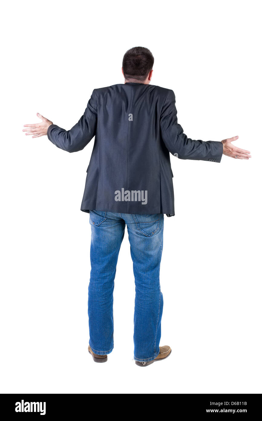 Back view of shocked and scared young business man. Holds hands upwards ...