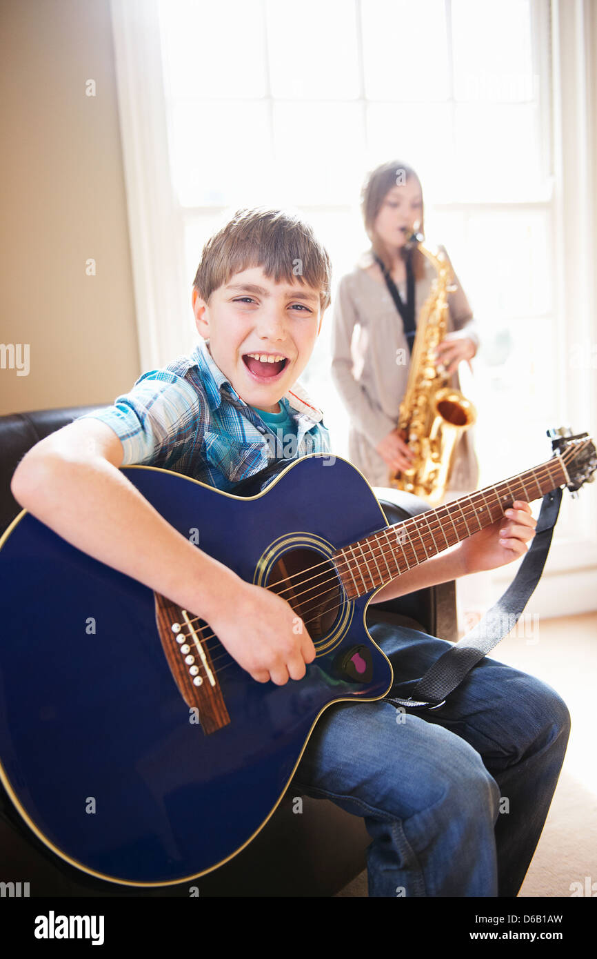 Children playing music together Stock Photo - Alamy