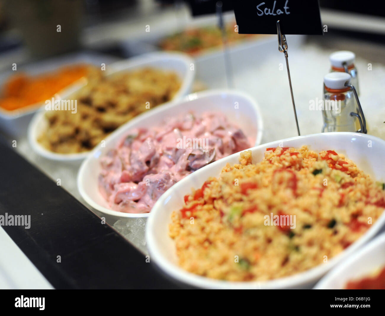 Salads stand on a table of the newly opened Cafe Schmus at the Jewish ...