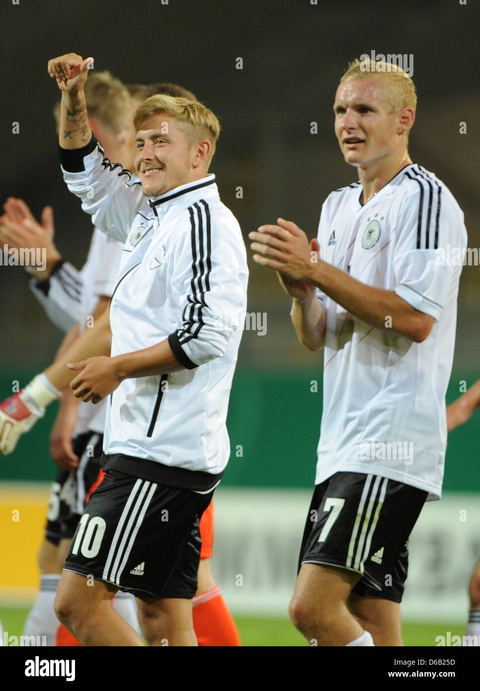 Germany's Lewis Holtby (L) and Sebastian Rode celebrate after the under ...