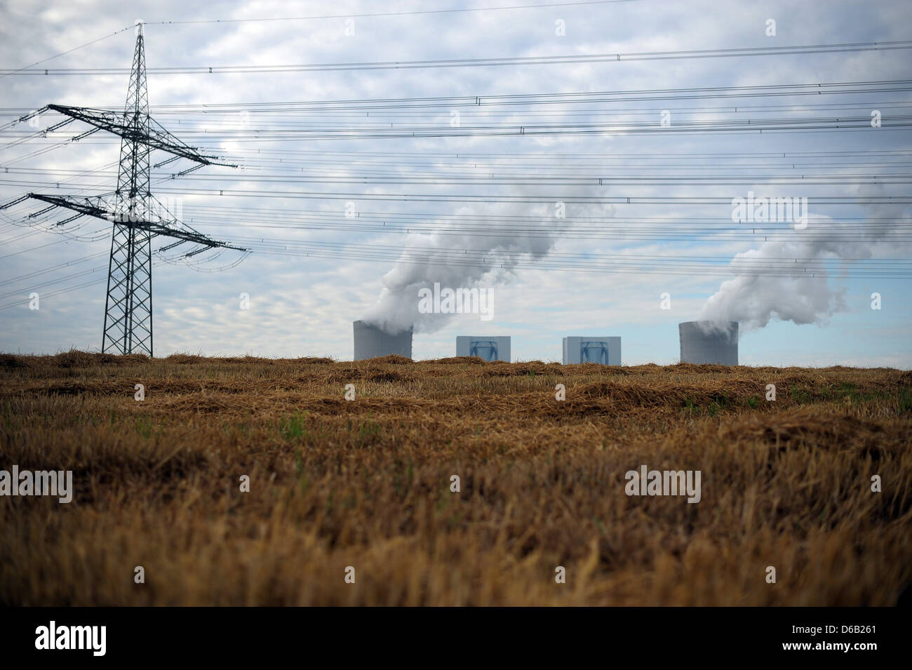 Smoke rises from the cooling towers of the new RWE power station in ...