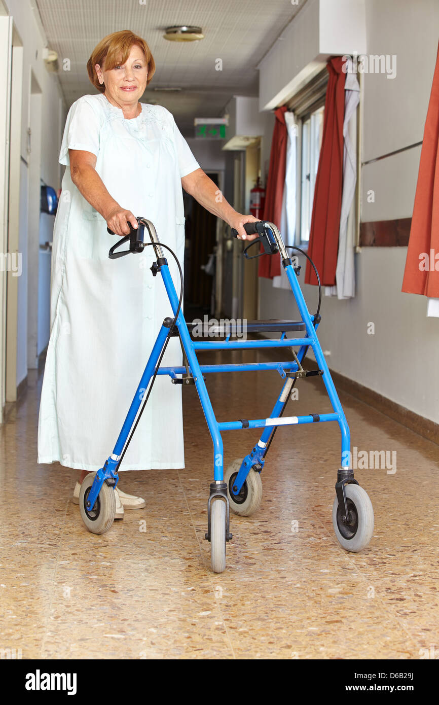 Woman walking with rollator hi-res stock photography and images - Alamy